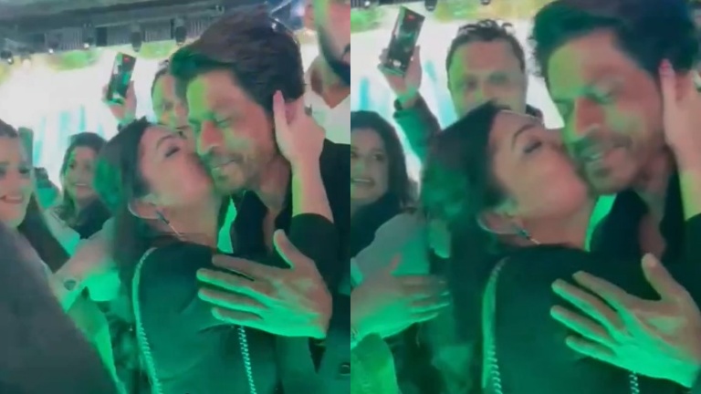 Shah Rukh Khan looks uncomfortable as fan forcefully kisses him
